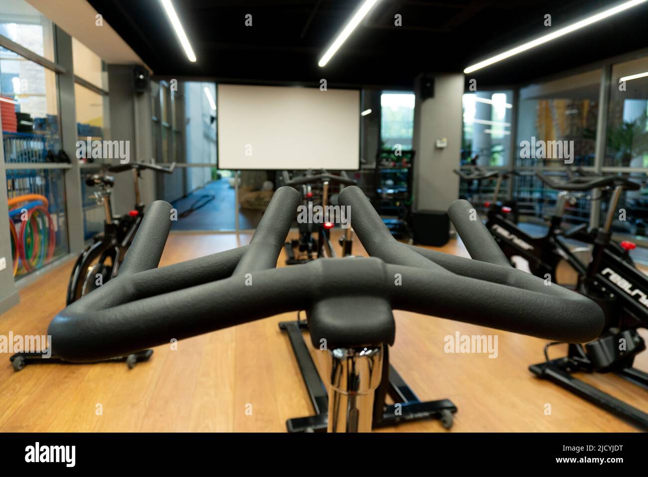 Steering wheel bike simulator classes seat exercise background black ...