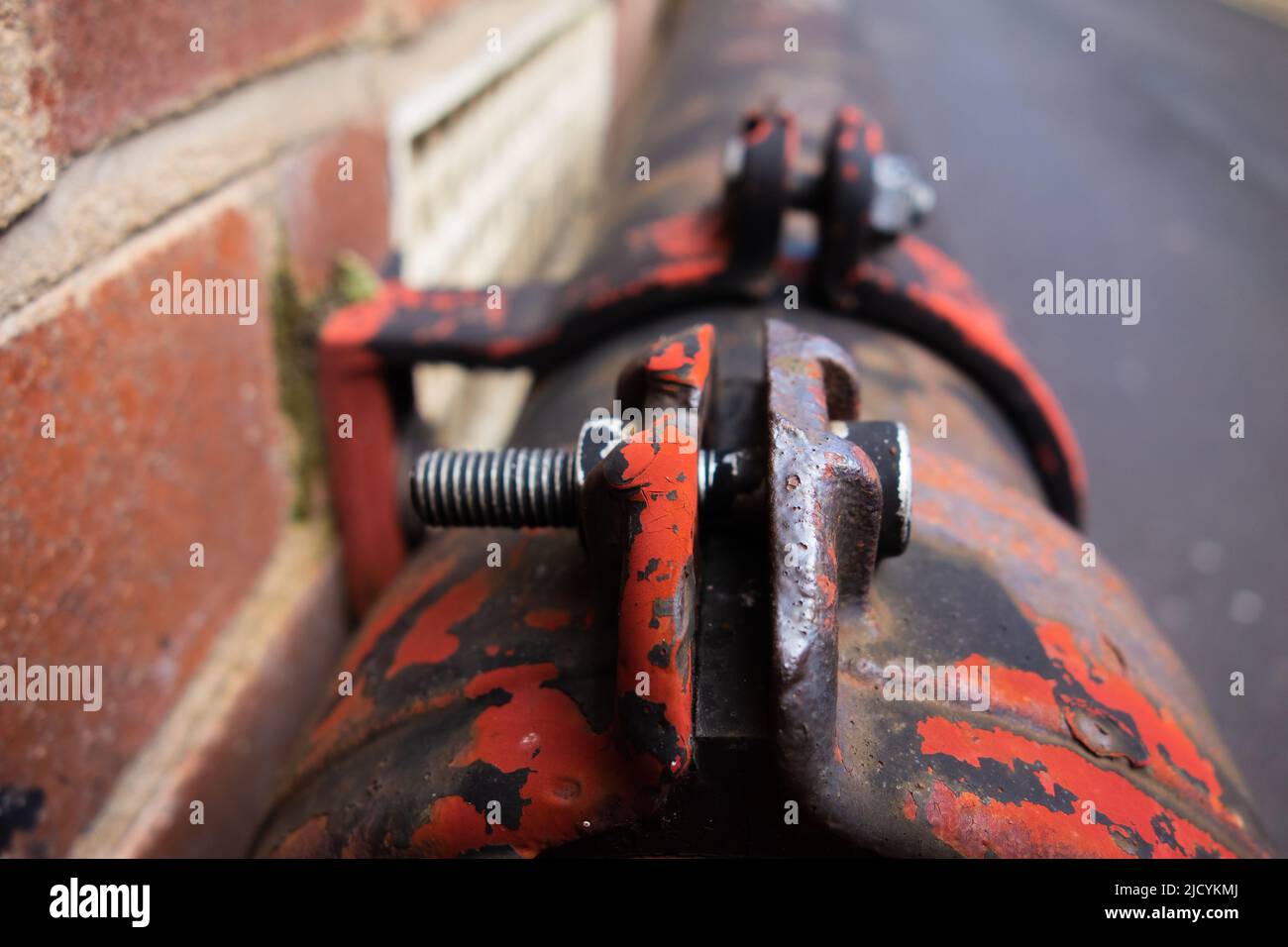 detail of an inspection joint screw clamps of a water drainage pipe ...