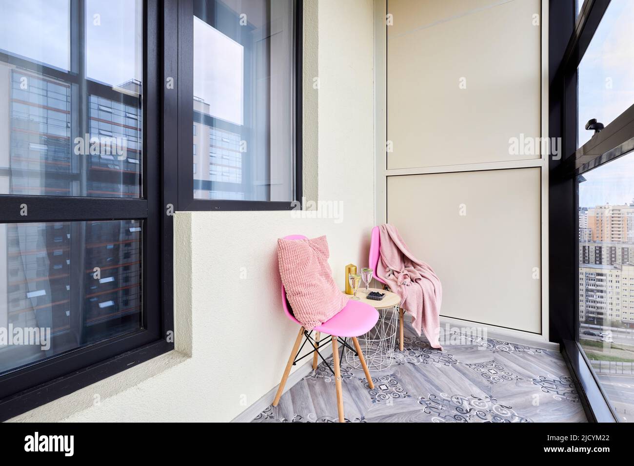 Modern balcony design, coffee table and beautiful view Stock Photo - Alamy