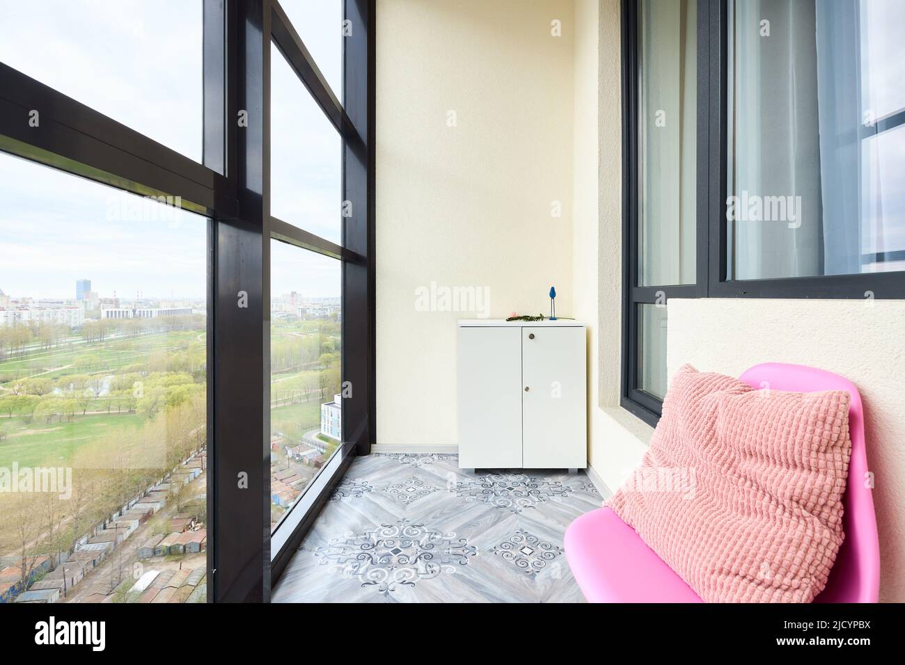 Modern balcony design, coffee table and beautiful view Stock Photo - Alamy