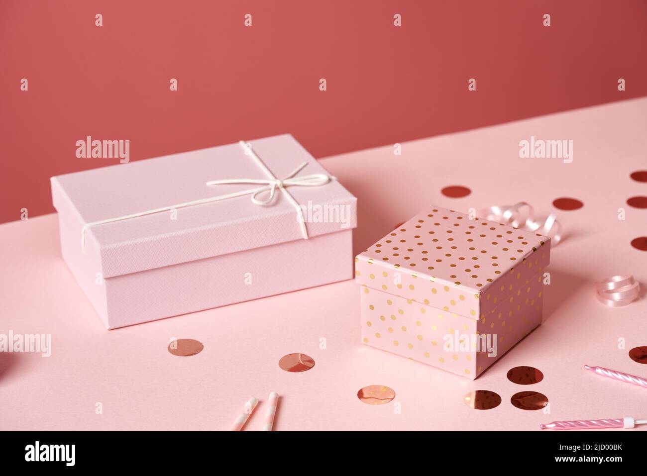 Pink gift boxes on a table - birthay celebration concept Stock Photo ...