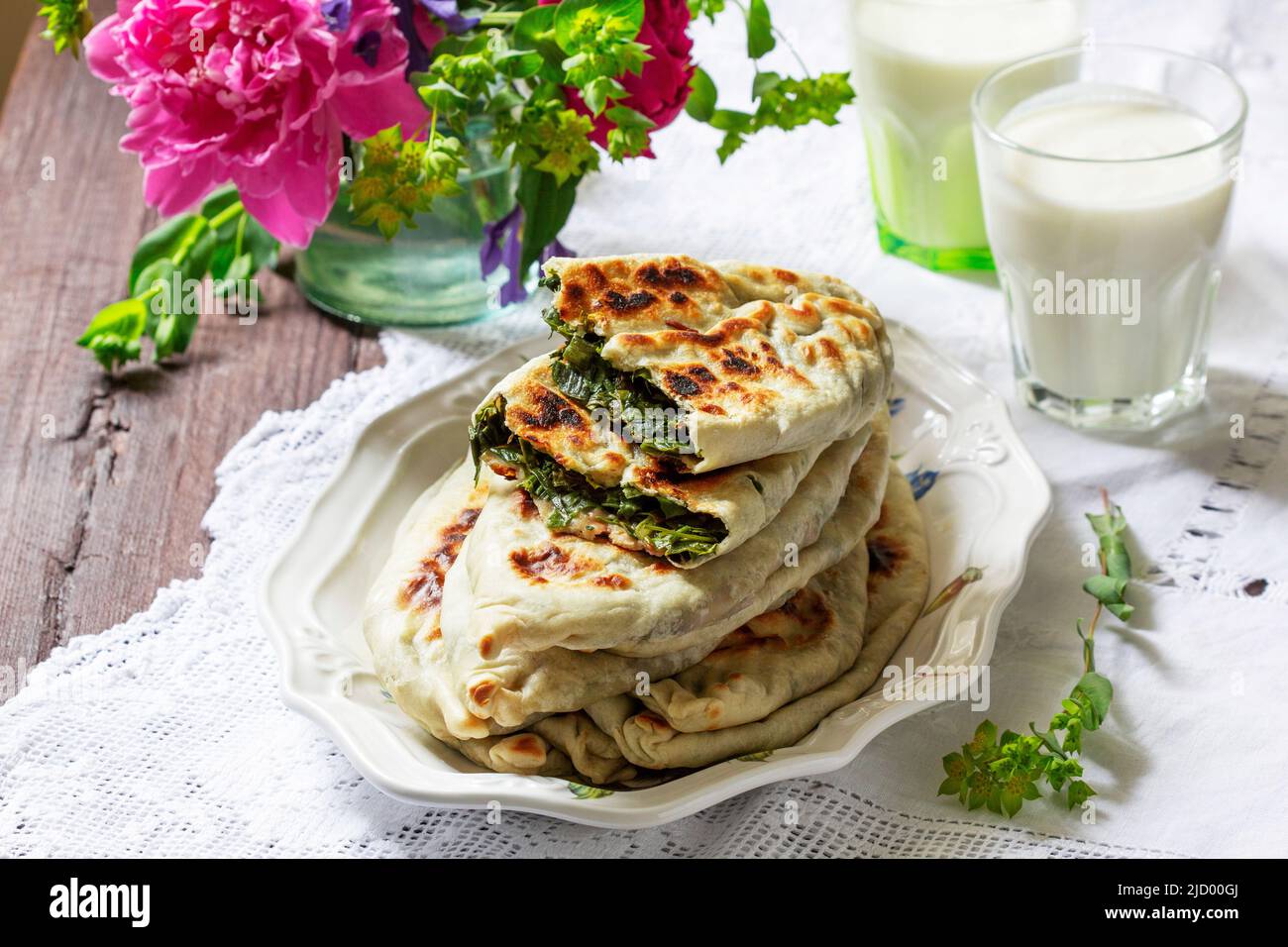 Traditional Armenian flatbread with greens zhengyalov hats, served with ...