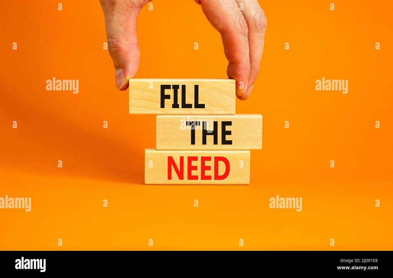 Fill the need symbol. Concept words Fill the need on wooden blocks on a ...