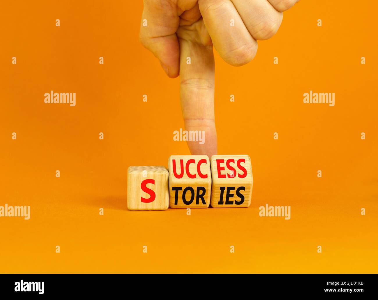 Success stories symbol. Concept words Success stories on wooden cubes ...