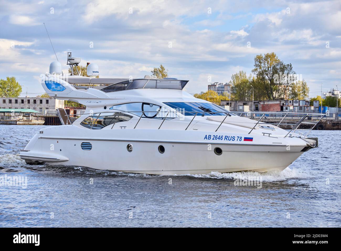 Luxury private motor yacht sailing in the river Stock Photo - Alamy