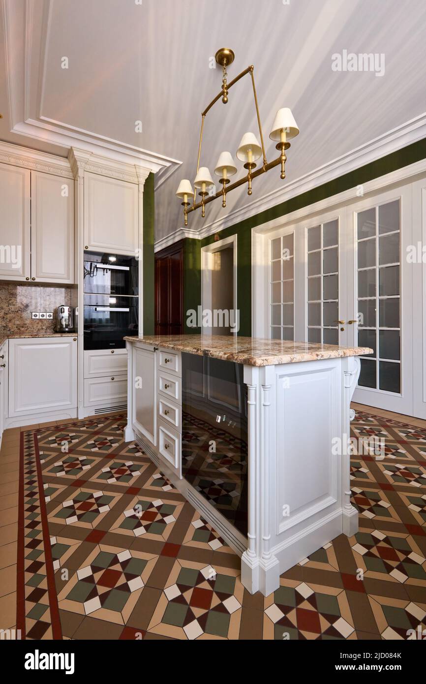 Photo of a beautiful and cozy kitchen Stock Photo - Alamy