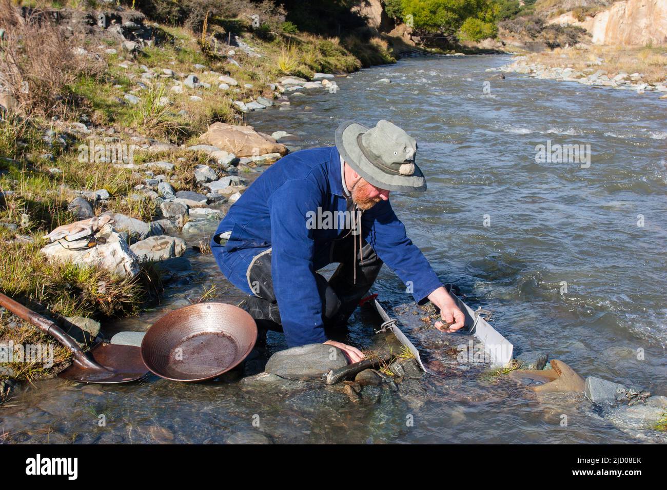 A look at life in New Zealand. Panning for Alluvial Gold, using the ...