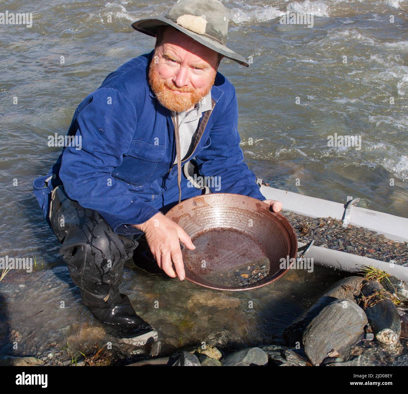 A look at life in New Zealand. Panning for Alluvial Gold, using the ...