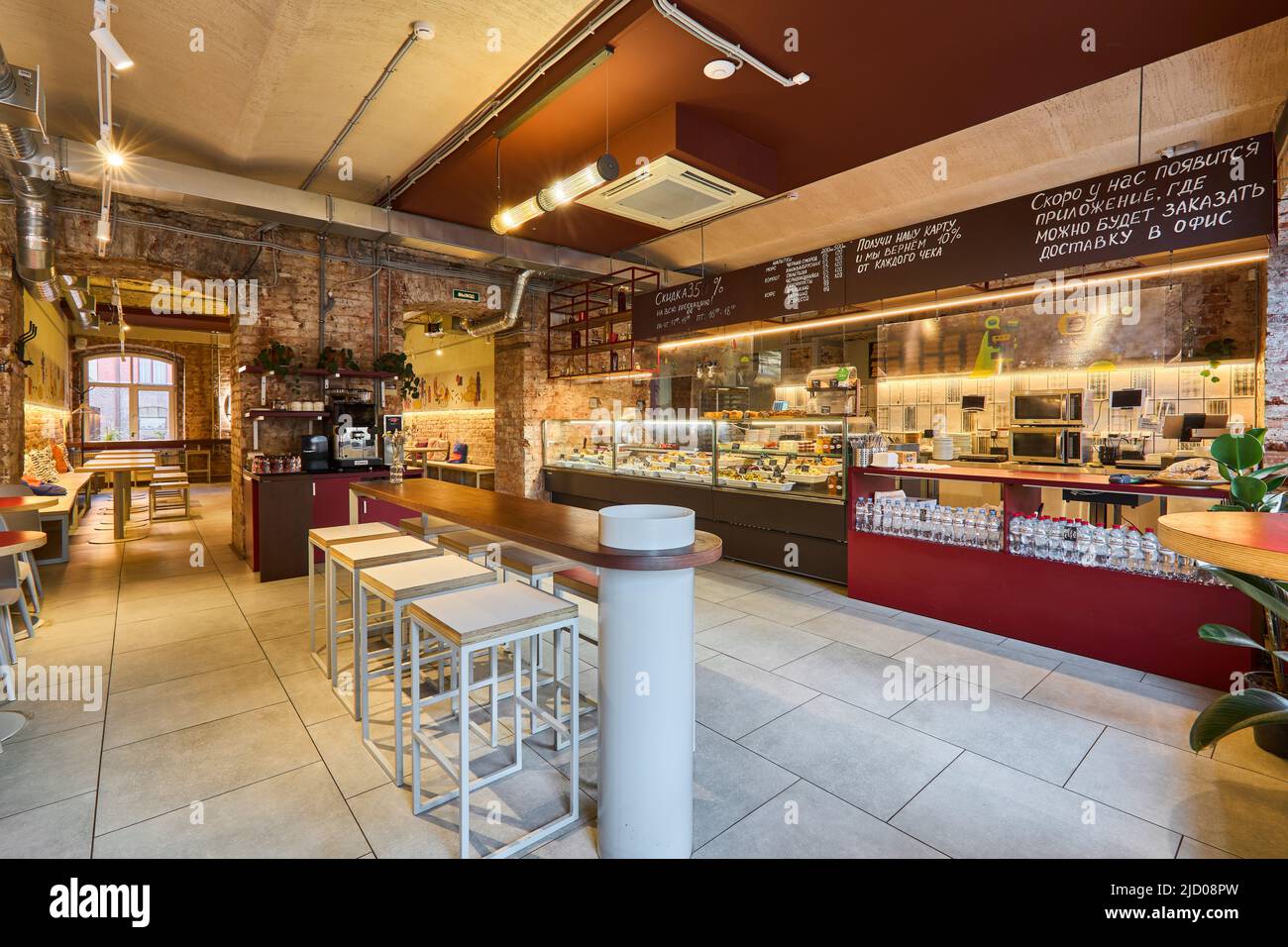 Photo of cafe interior during daytime with artificial light Stock Photo ...