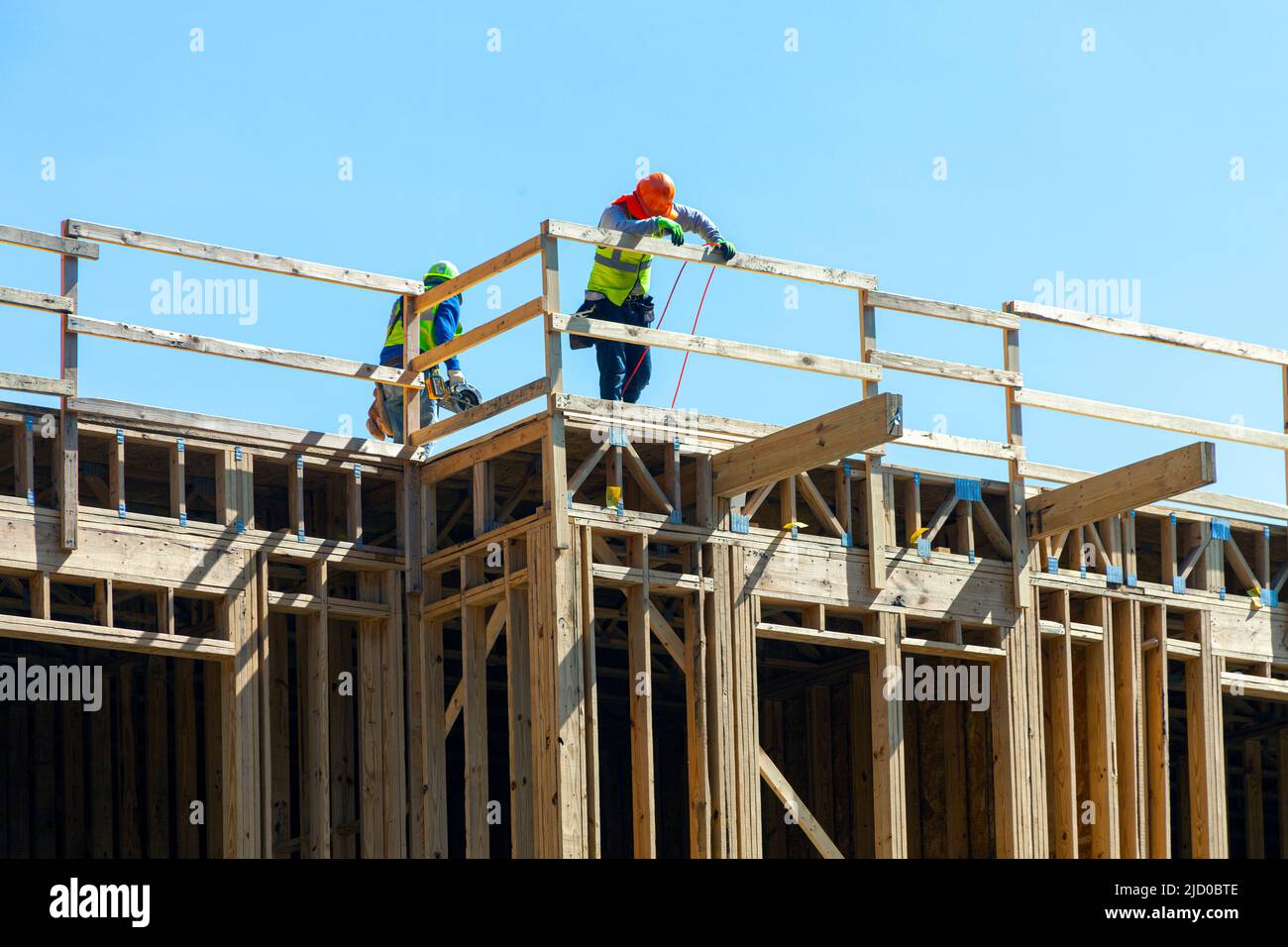 Construction framing in wood, buildings and houses Stock Photo - Alamy