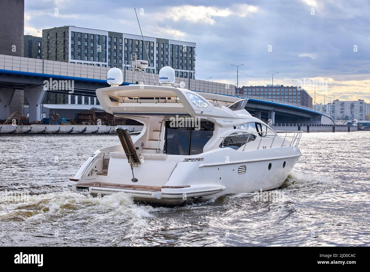 Luxury private motor yacht sailing in the river Stock Photo - Alamy