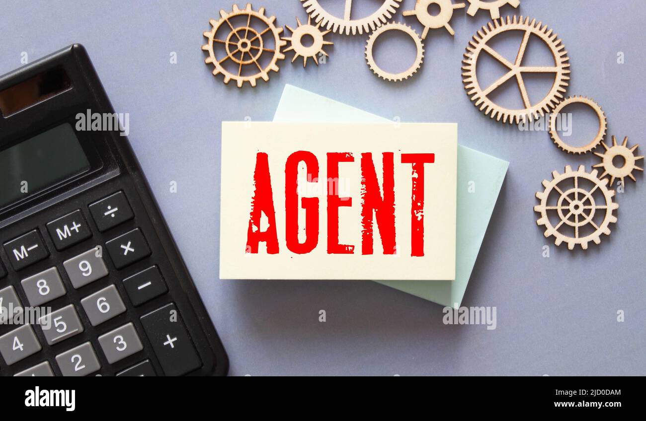 Letter block in word agent on wood background Stock Photo - Alamy
