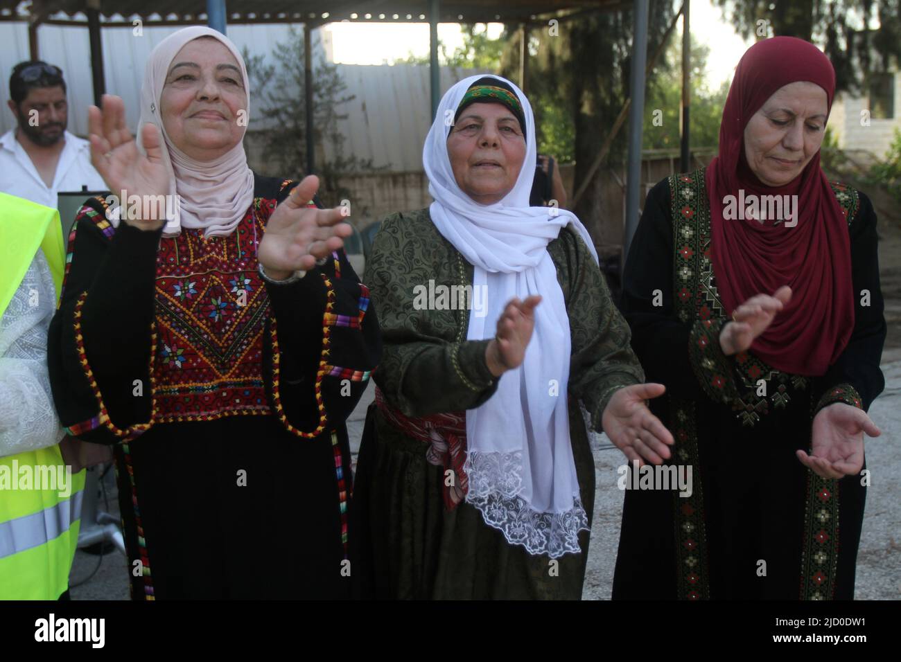 Palestinian elderly women wearing the old Palestinian traditional ...