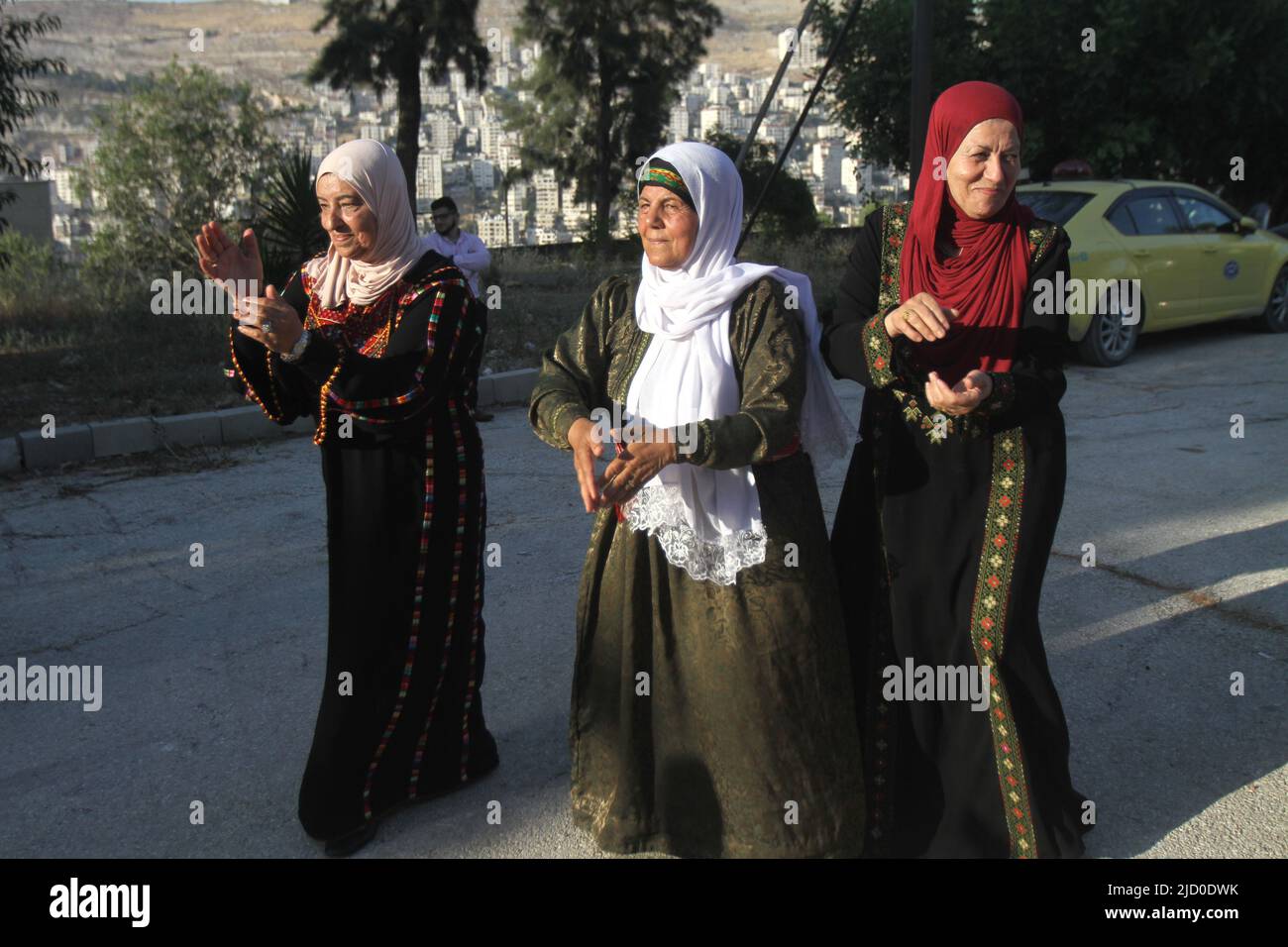 Palestinian elderly women wearing the old Palestinian traditional ...
