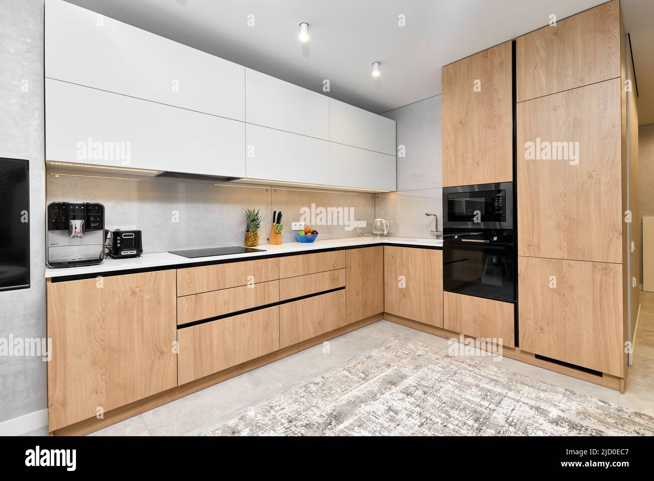 Photo of a beautiful and stylish wooden kitchen Stock Photo - Alamy