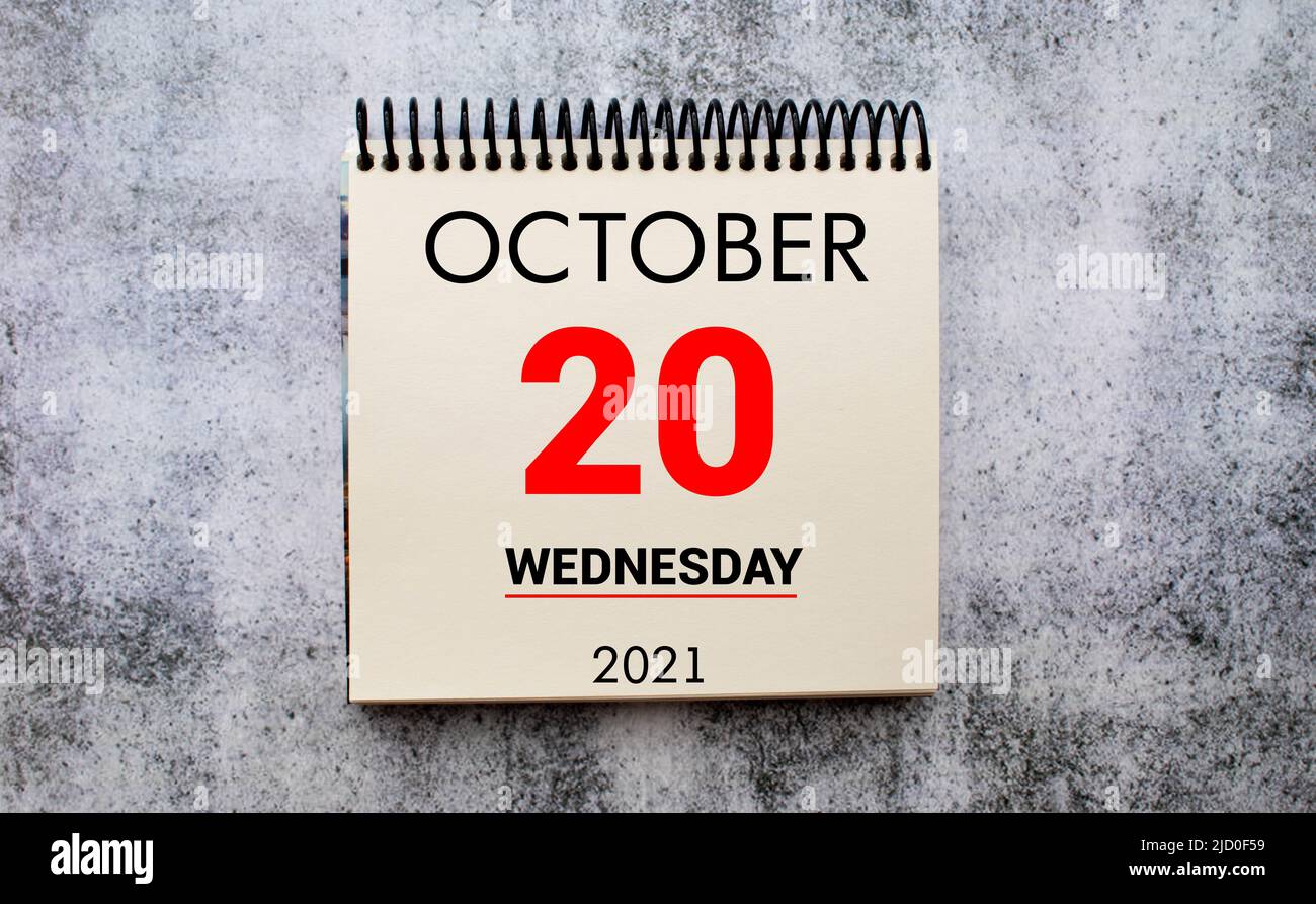 Save the Date written on a calendar - October 20 Stock Photo - Alamy