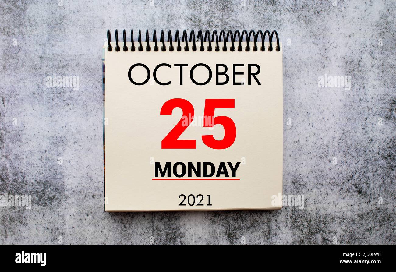 Save the Date written on a calendar - October 25 Stock Photo - Alamy