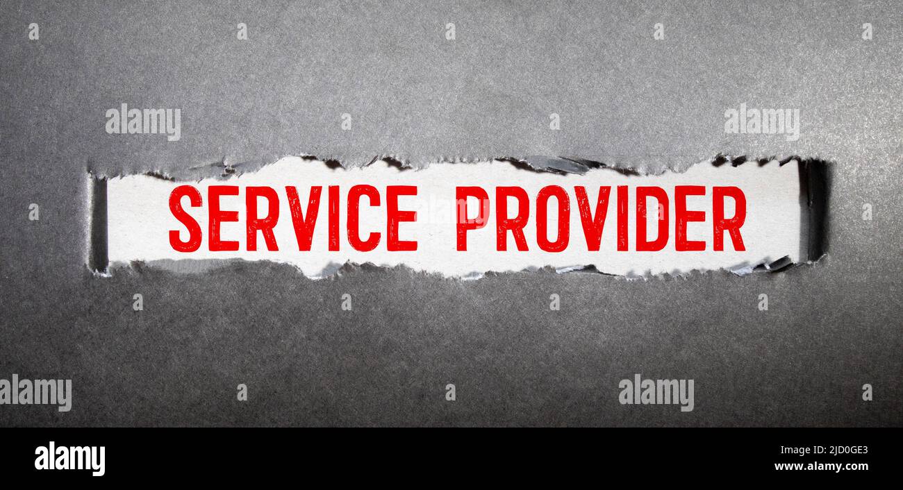 Service Provider. white torn paper on brown torn paper background ...