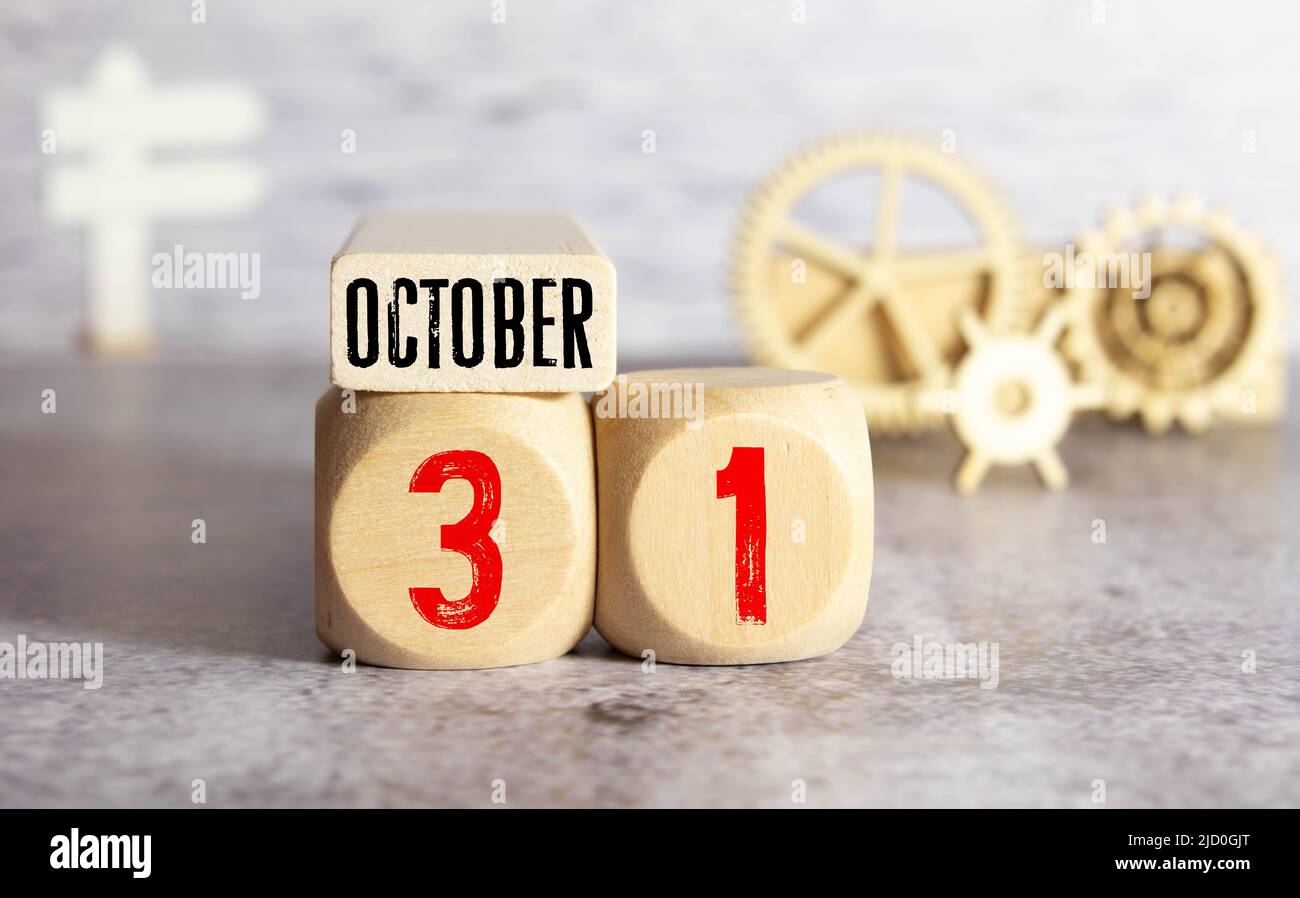 October 31th. Image of October 31 wooden color calendar on white brick ...
