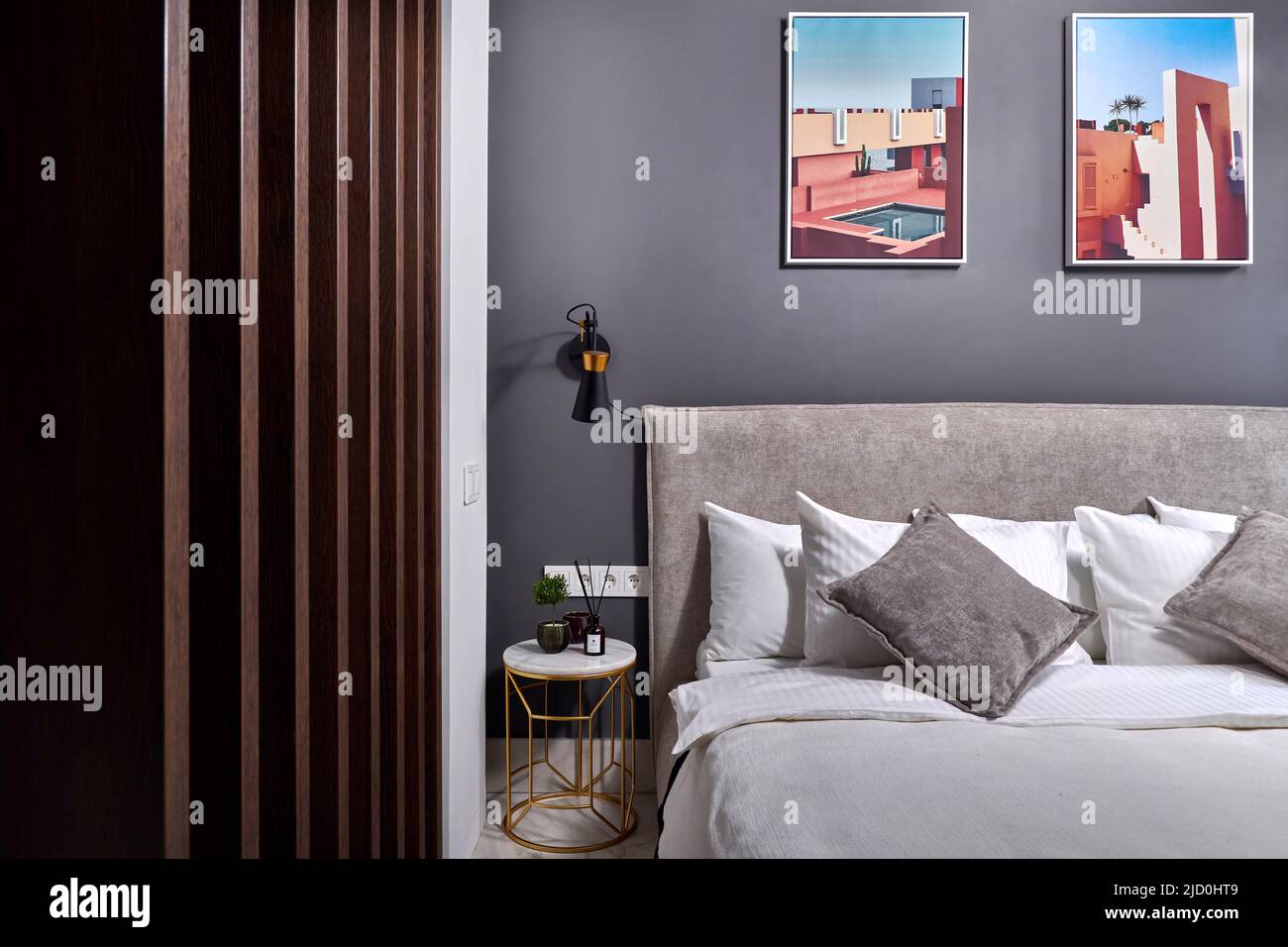 Photographs of a bed in a bedroom with flash light Stock Photo - Alamy