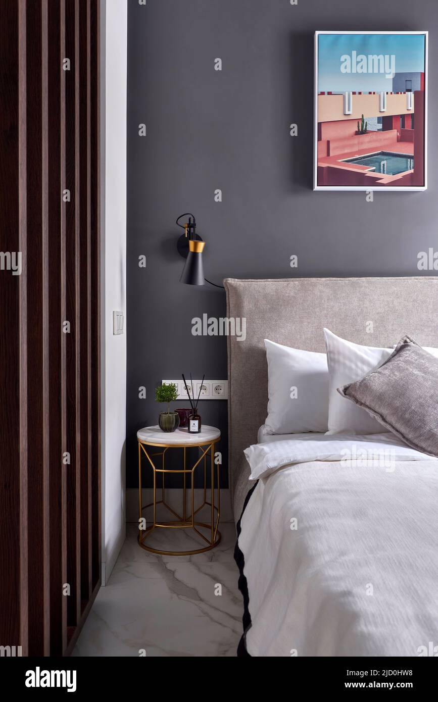 Photographs of a bed in a bedroom with flash light Stock Photo - Alamy