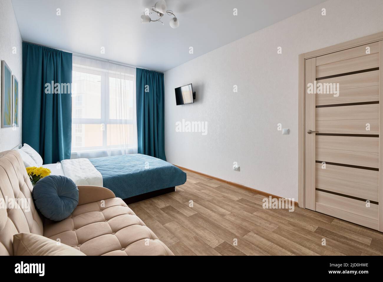 A cozy studio apartment with different decor Stock Photo - Alamy
