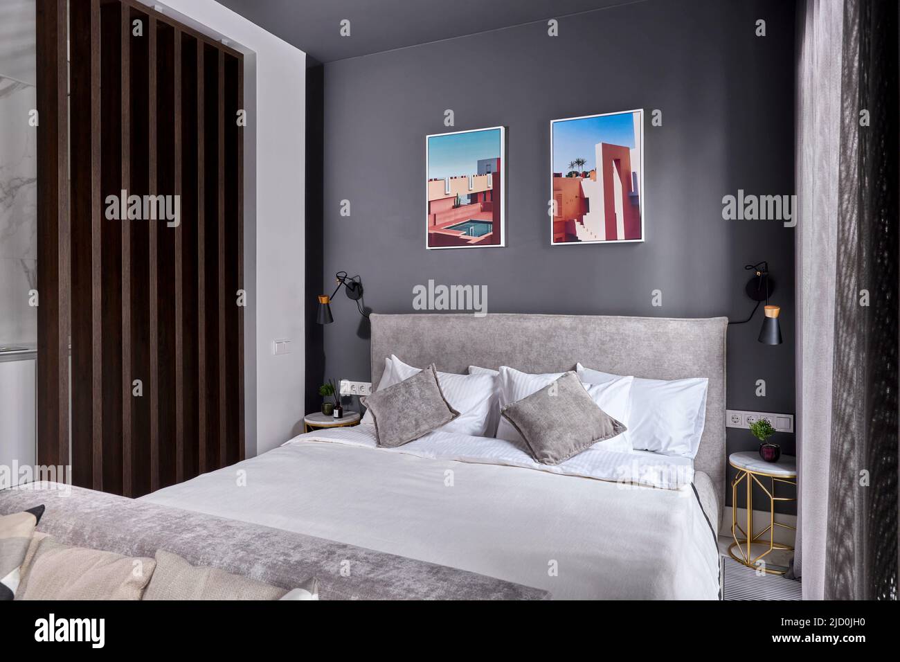 Photographs of a bed in a bedroom with flash light Stock Photo - Alamy