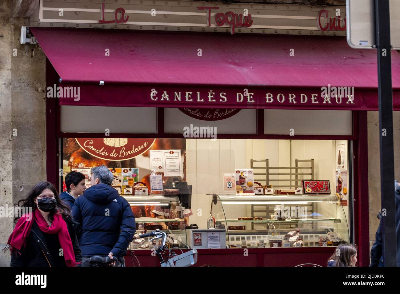 Picture of a shop, a bakery, selling Caneles Bordeaux, in the city ...