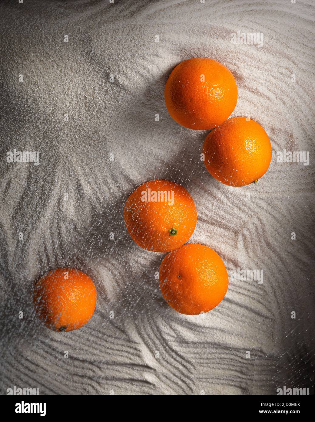 Five tangerines lying on semolina. High quality Stock Photo - Alamy