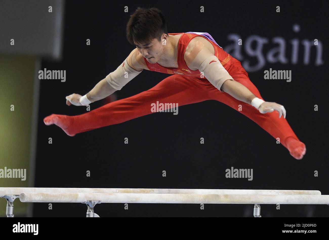 Doha. 16th June, 2022. Lin Chaopan of China competes in the parallel ...