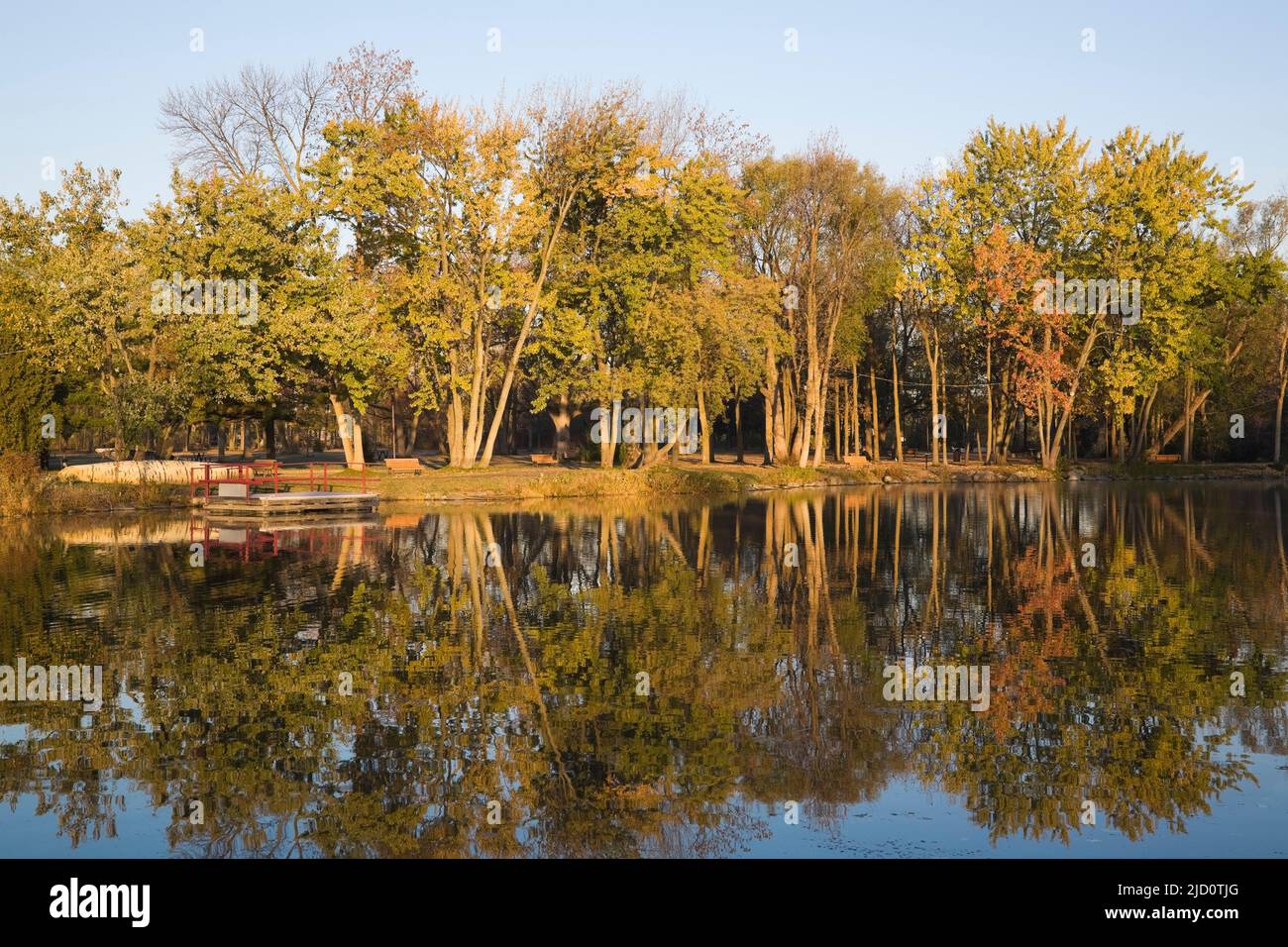 Dock on Riviere des Mille-Iles in autumn, Ile des Moulins Historical ...