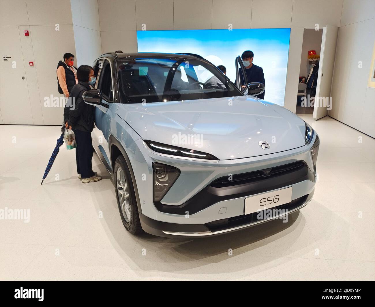 SHANGHAI, CHINA - NOVEMBER 28, 2021 - Customers look at ES6 models at a Nextev store in Shanghai ...