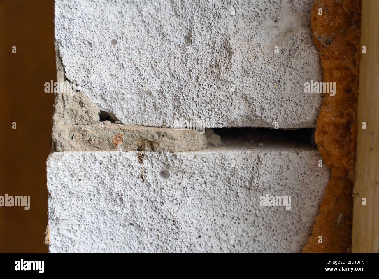 The gap between the window and the wall is filled with mounting foam ...