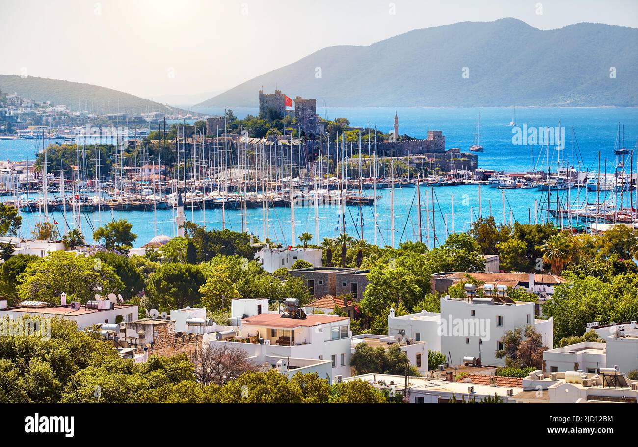 View of Bodrum castle and Marina Harbor in Aegean sea with sail boats ...