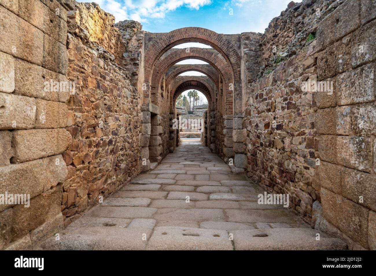 An arched corridor leading to the Roman Theatre of Merida, Merida ...