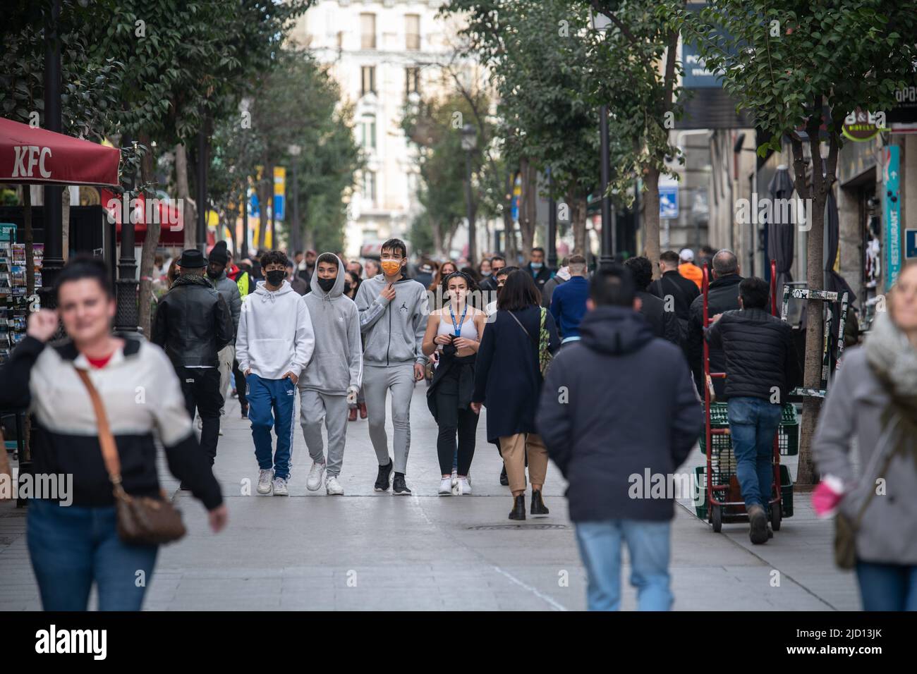 People walking in a busy street, Madrid, Spain Stock Photo - Alamy