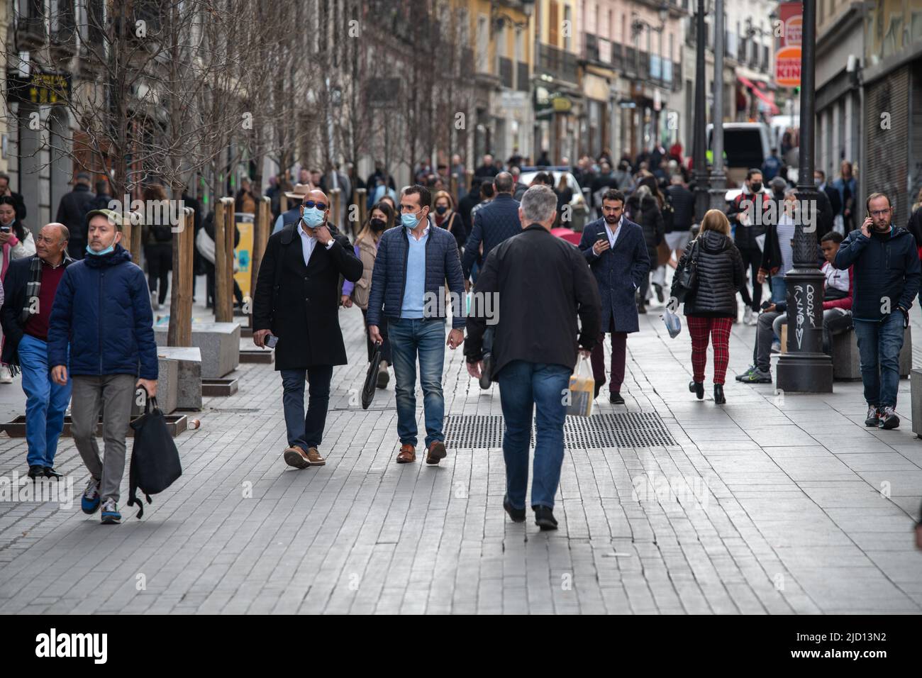 People walking in a busy street, Madrid, Spain Stock Photo - Alamy
