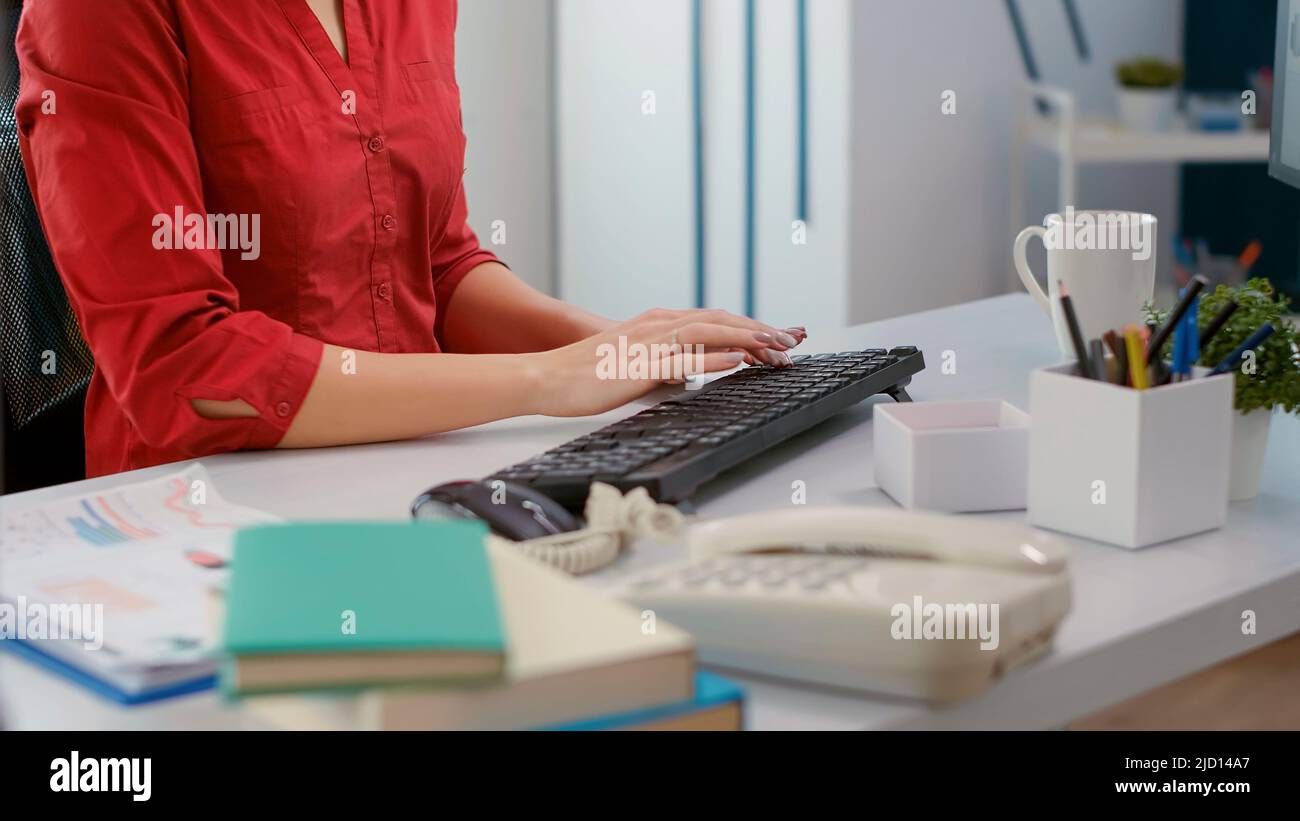 Portrait of business woman working with marketing sales diagrams ...