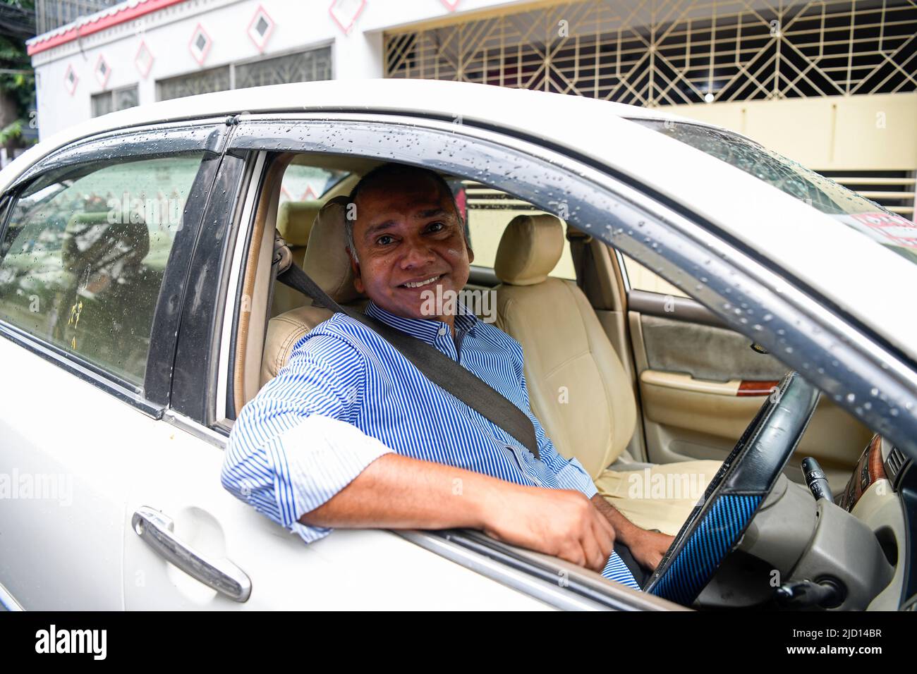 Dhaka, Bangladesh. 16th June, 2022. An Uber driver poses for a portrait ...