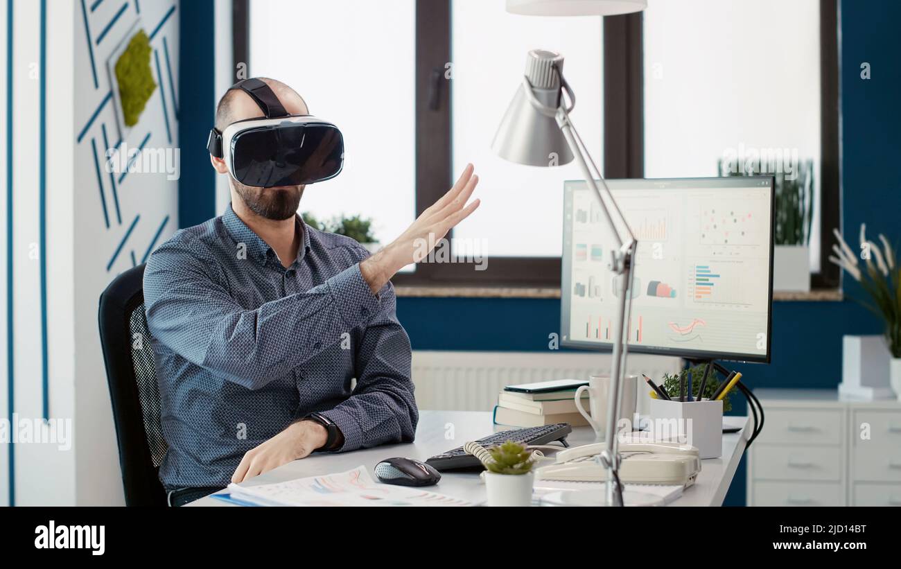 Sales consultant working with vr goggles for business growth, using ...
