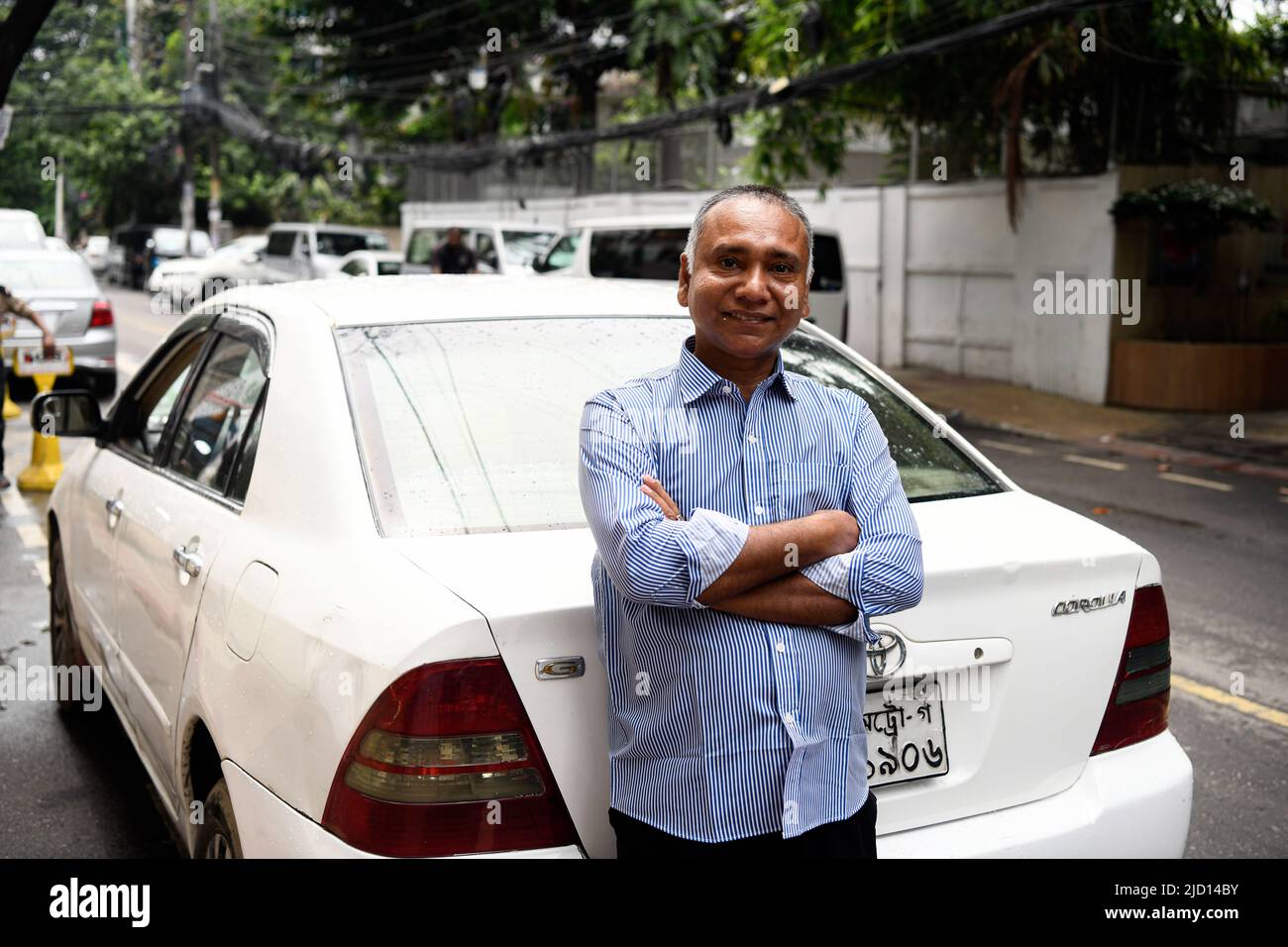 Dhaka, Bangladesh. 16th June, 2022. An Uber driver poses for a portrait ...