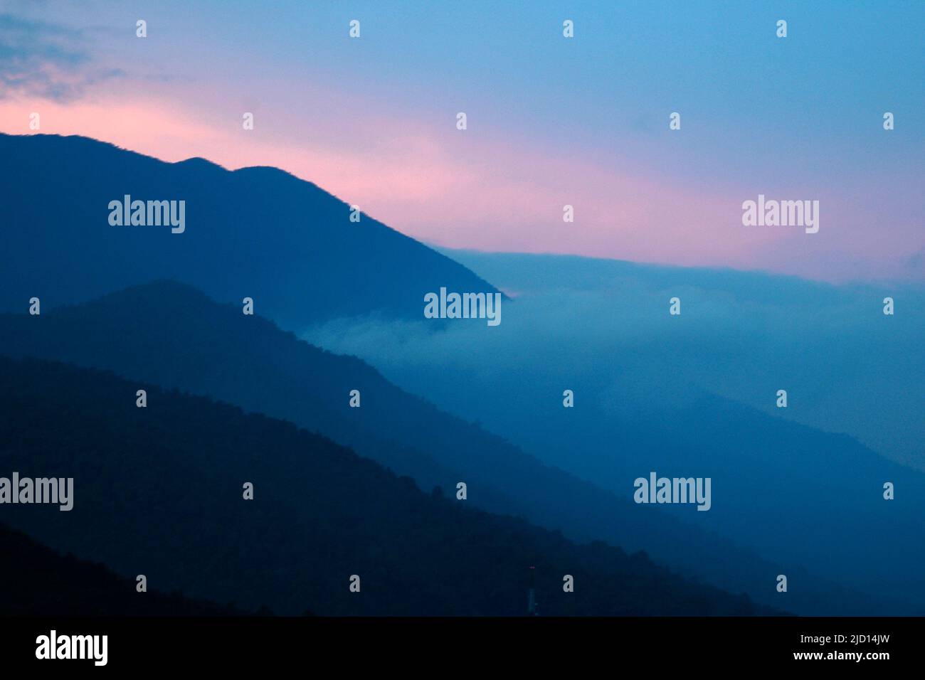 Early morning view of the slope of Mount Pangrango and lower adjacent ...
