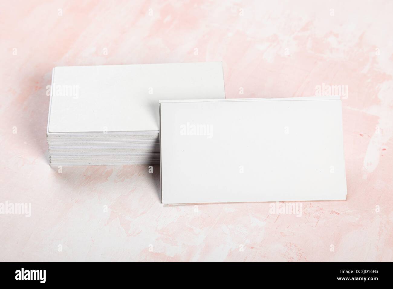 Photos of business cards. Mock-up for corporate identity on a pink ...