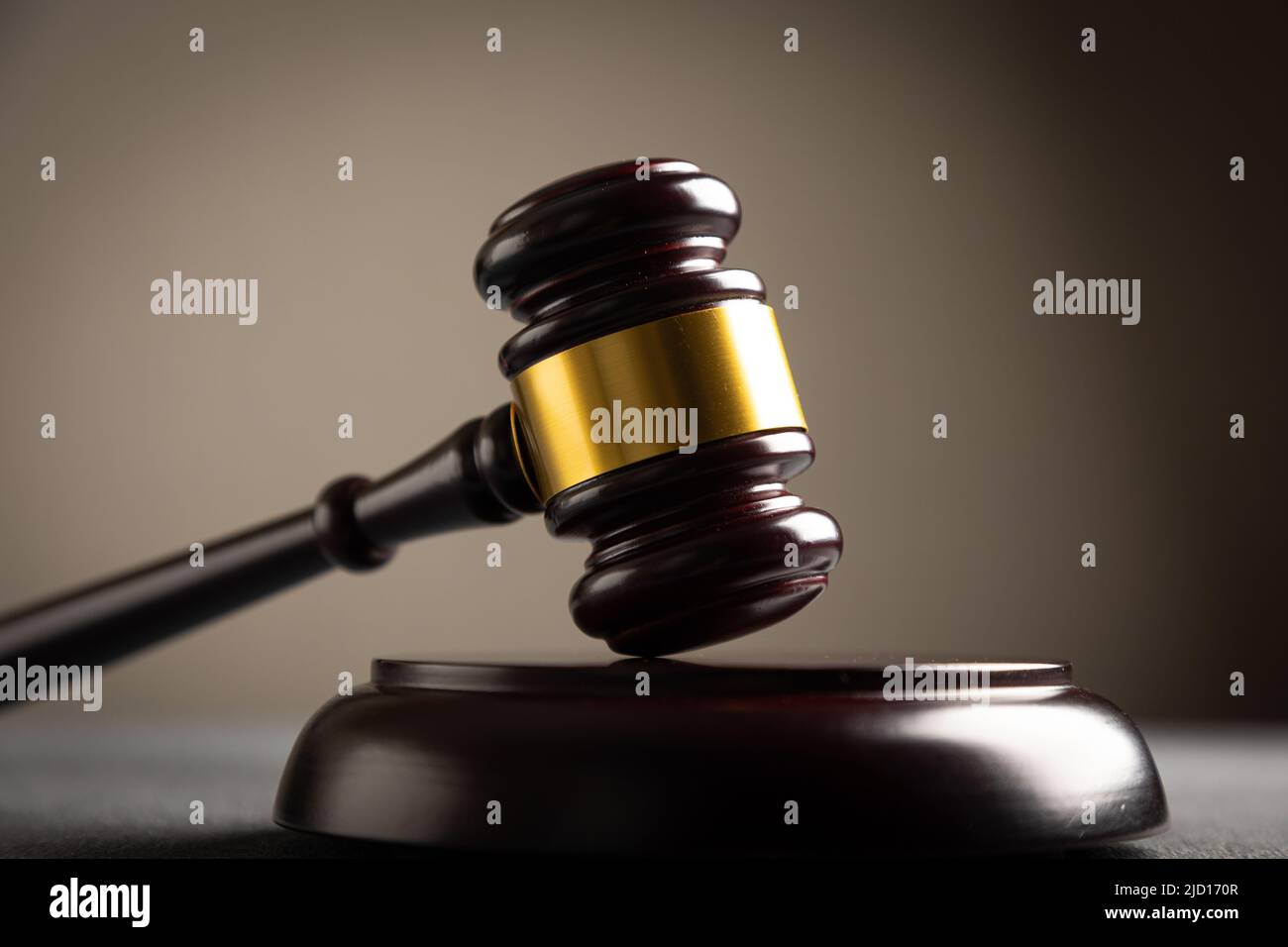 Law theme, mallet of the judge on wooden desk with Lady Justice Statue ...