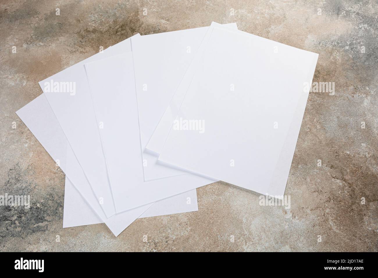 stack of white business card sheet of paper a4 stack on grunge table ...