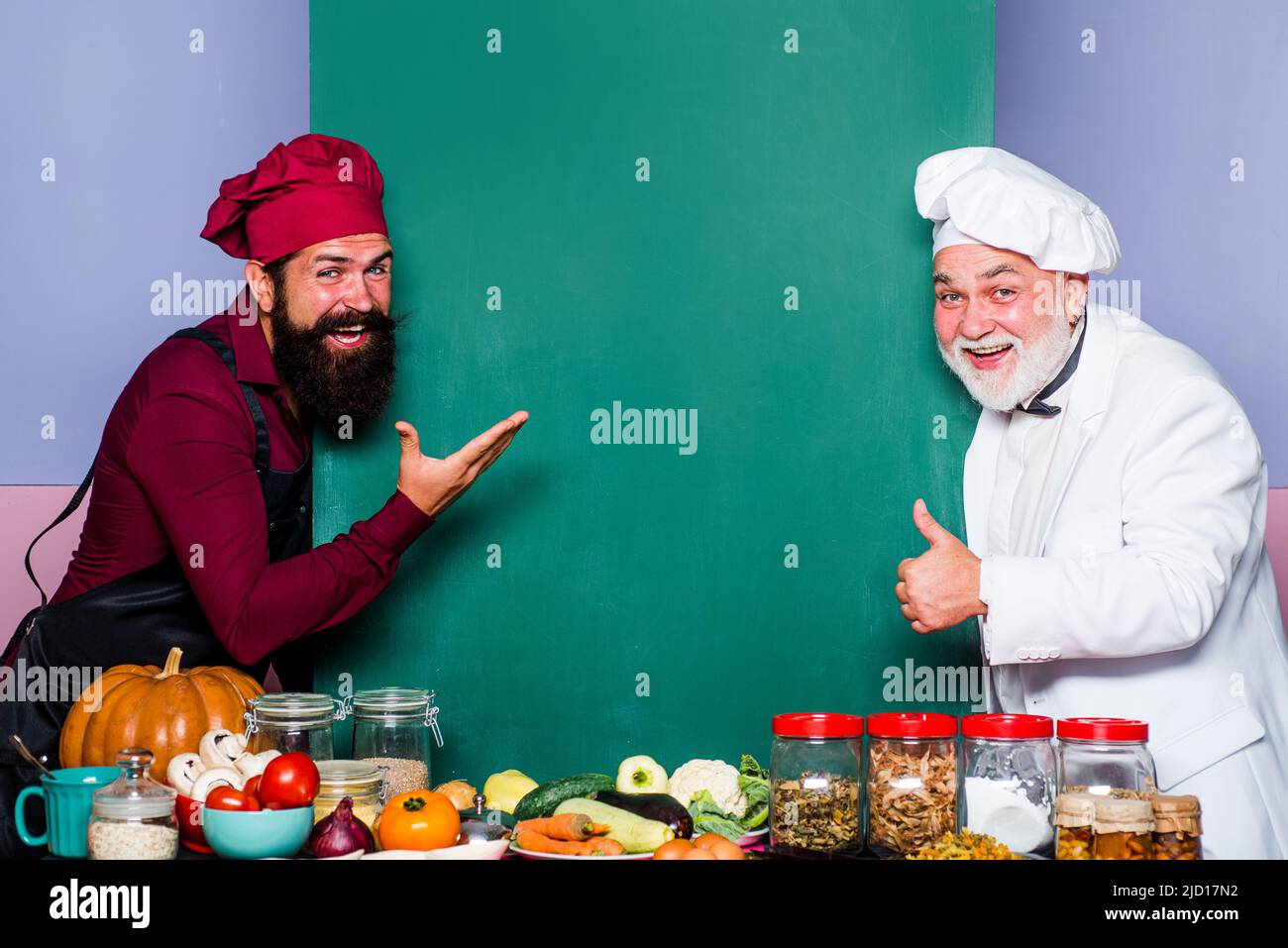 Chef, cook or baker by empty chalkboard menu. Kitchen chef. Chef cook ...