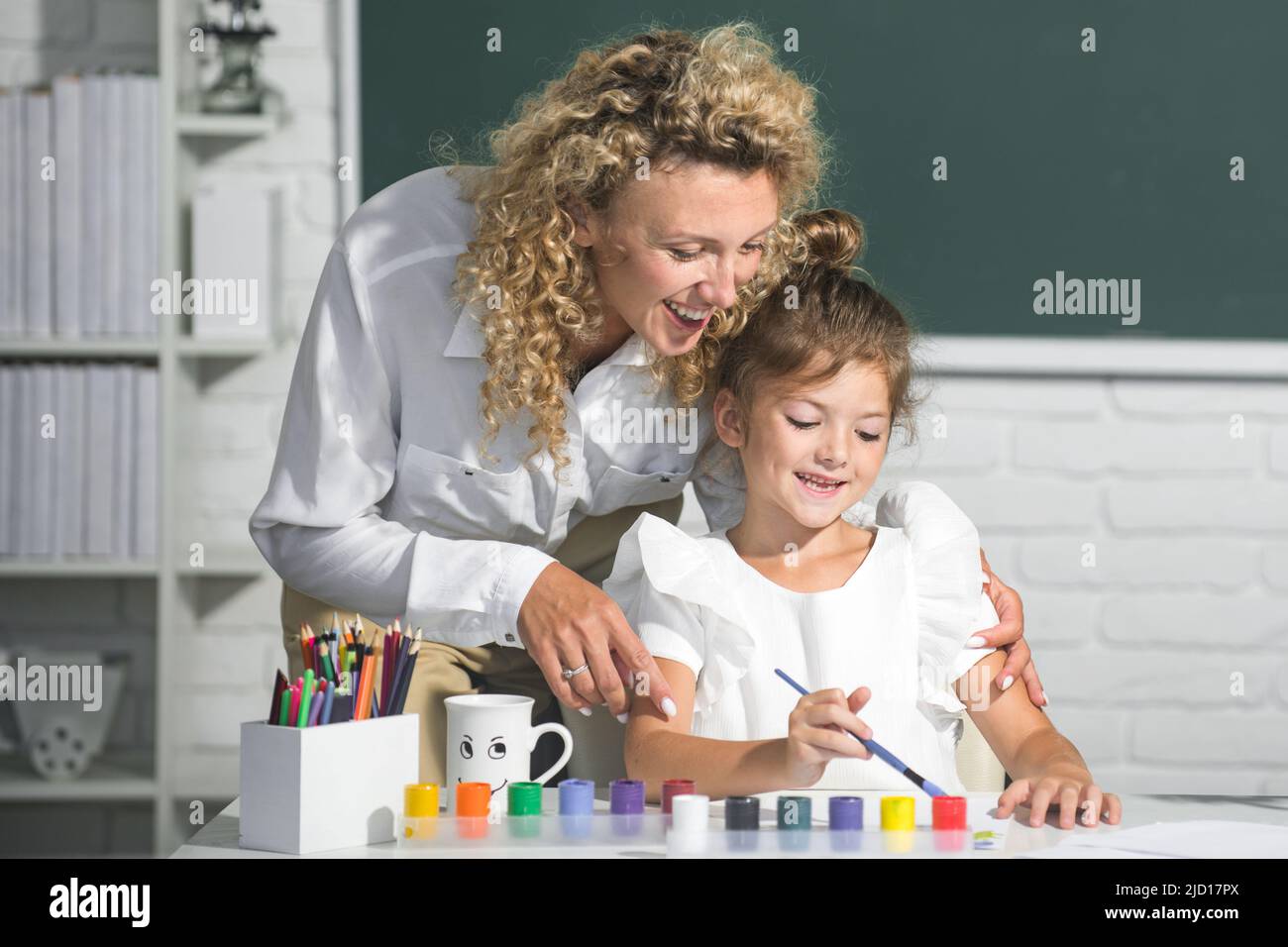 Schoolkids with teacher. Teacher and little students portrait, teachers ...