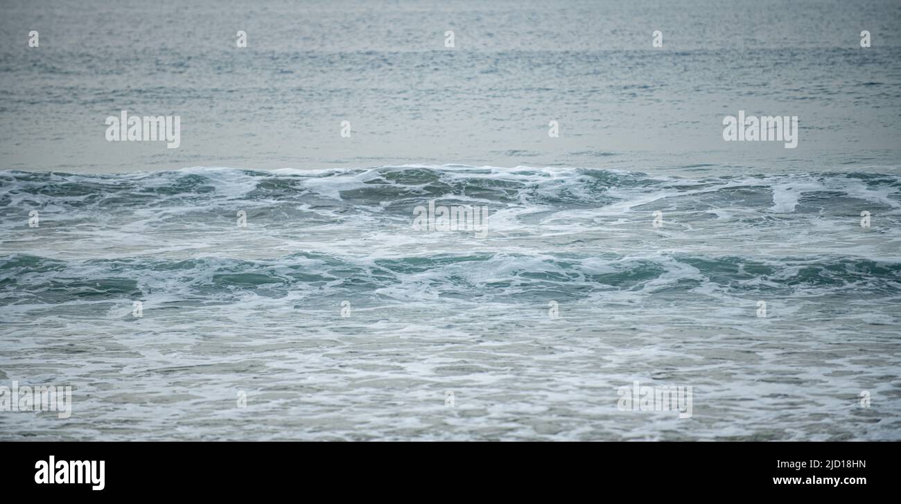 Summer beach, ocean waves on a tropical sea with deep blue wawes. Calm ...