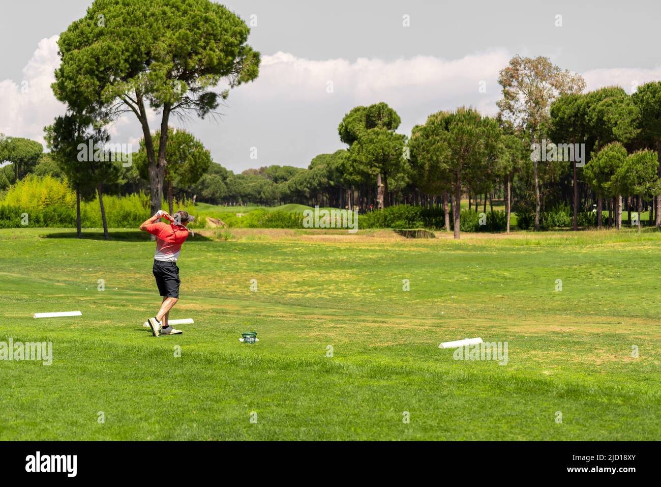 Golf player swing hi-res stock photography and images - Alamy
