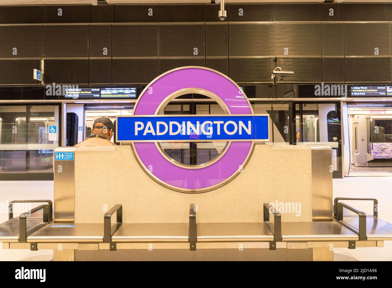 Purple roundel sign installed at London underground station Paddington ...
